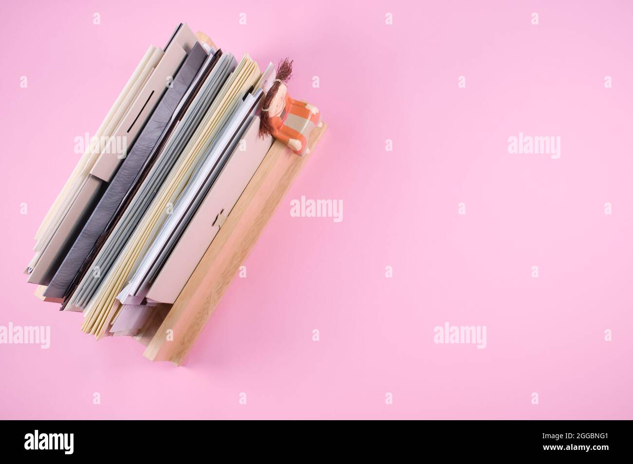 Close up of documents isolated on pink color background with free space ...