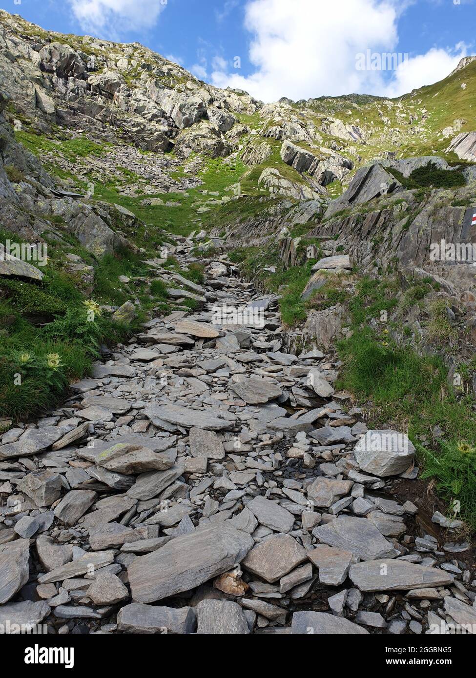 Rocky path into the mountain Stock Photo - Alamy