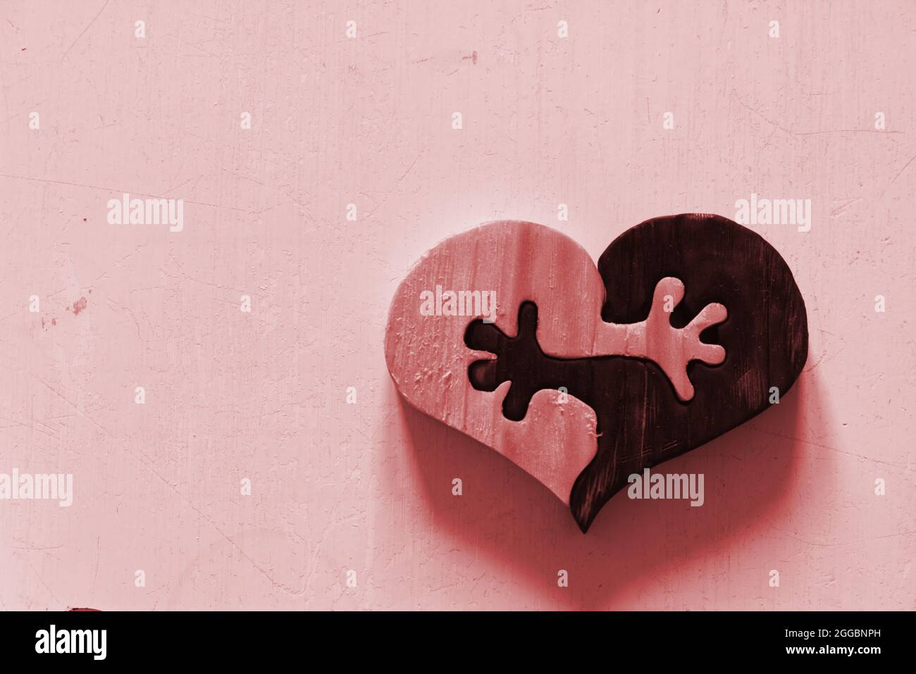 wooden heart ying yang hands red sepia Stock Photo - Alamy
