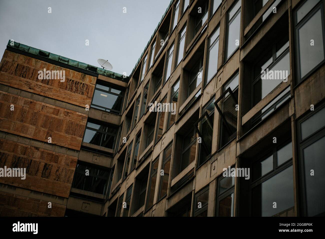Beautiful view of the front facade of a building against a cloudy sky ...