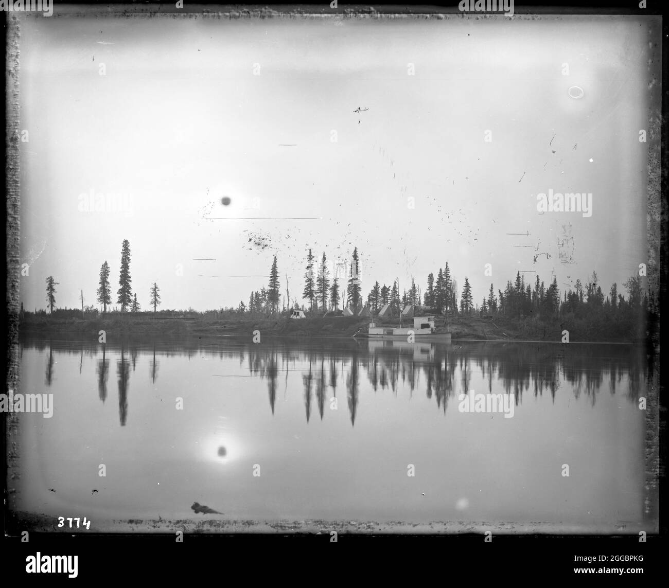 Northern Alaska Exploring Expedition, 1884-1886. Tents and river boat ...