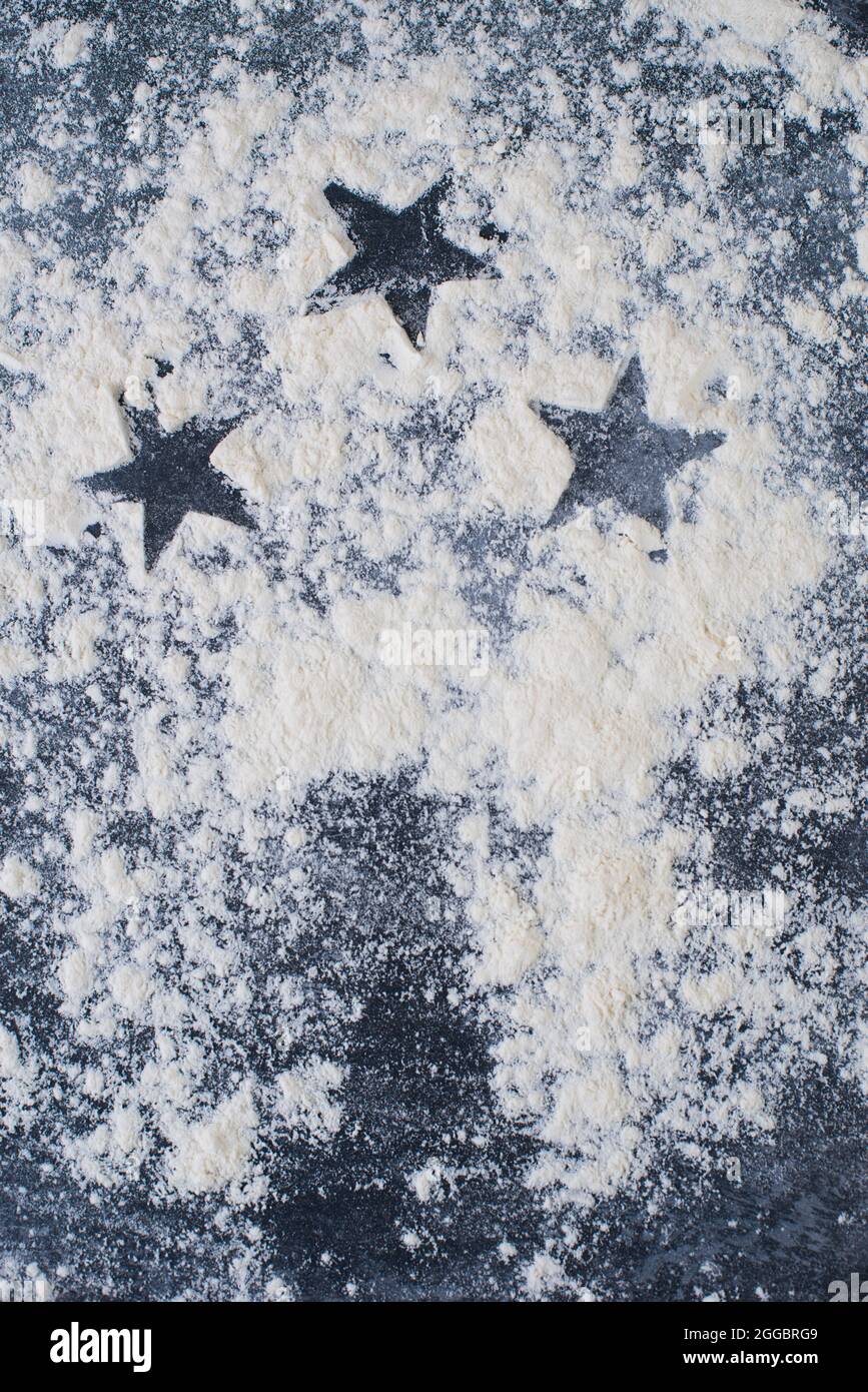 Vertical closeup of star shapes on the flour Stock Photo - Alamy