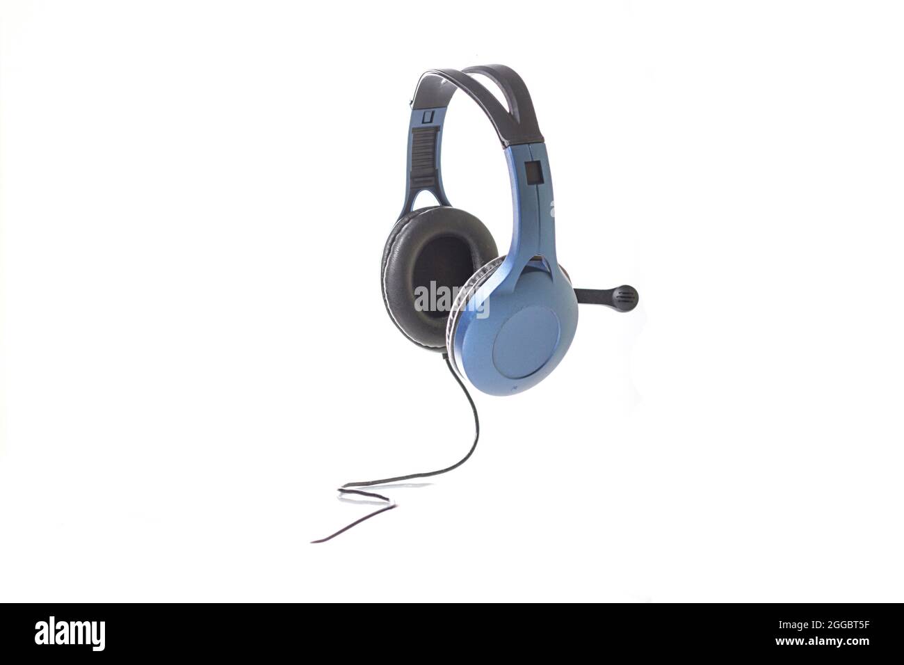 Blue headset isolated on a white background Stock Photo - Alamy