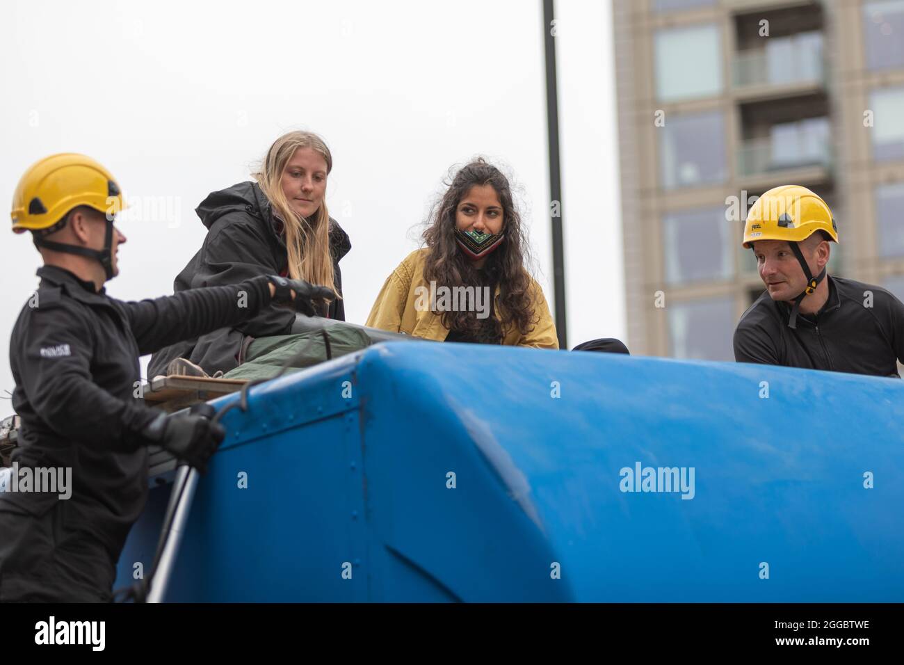 London, UK. 30th Aug 2021. Extinction Rebellion protesters positioned ...