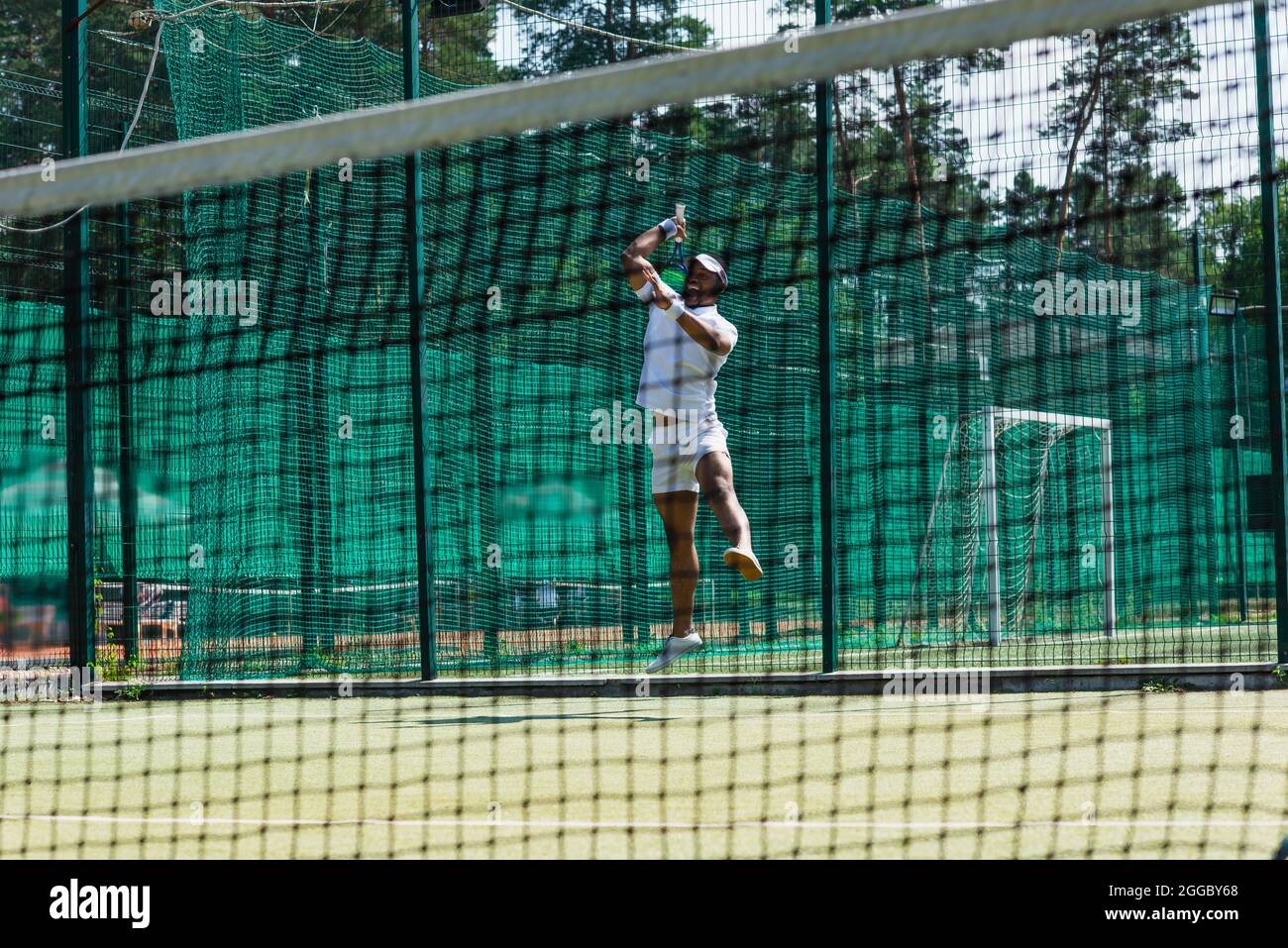 Men jump tennis hi-res stock photography and images - Alamy