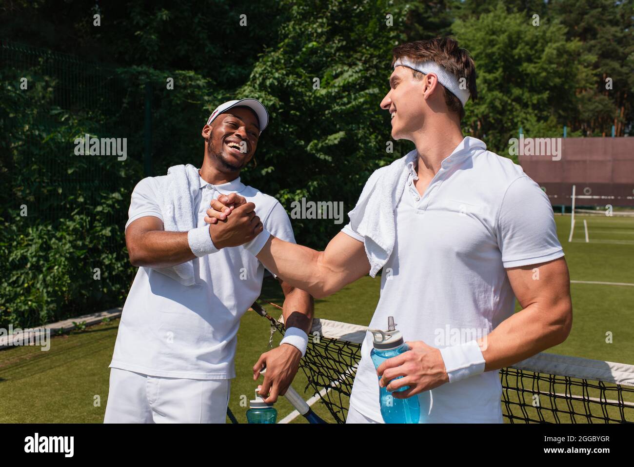Sports people shaking hands hi-res stock photography and images - Alamy