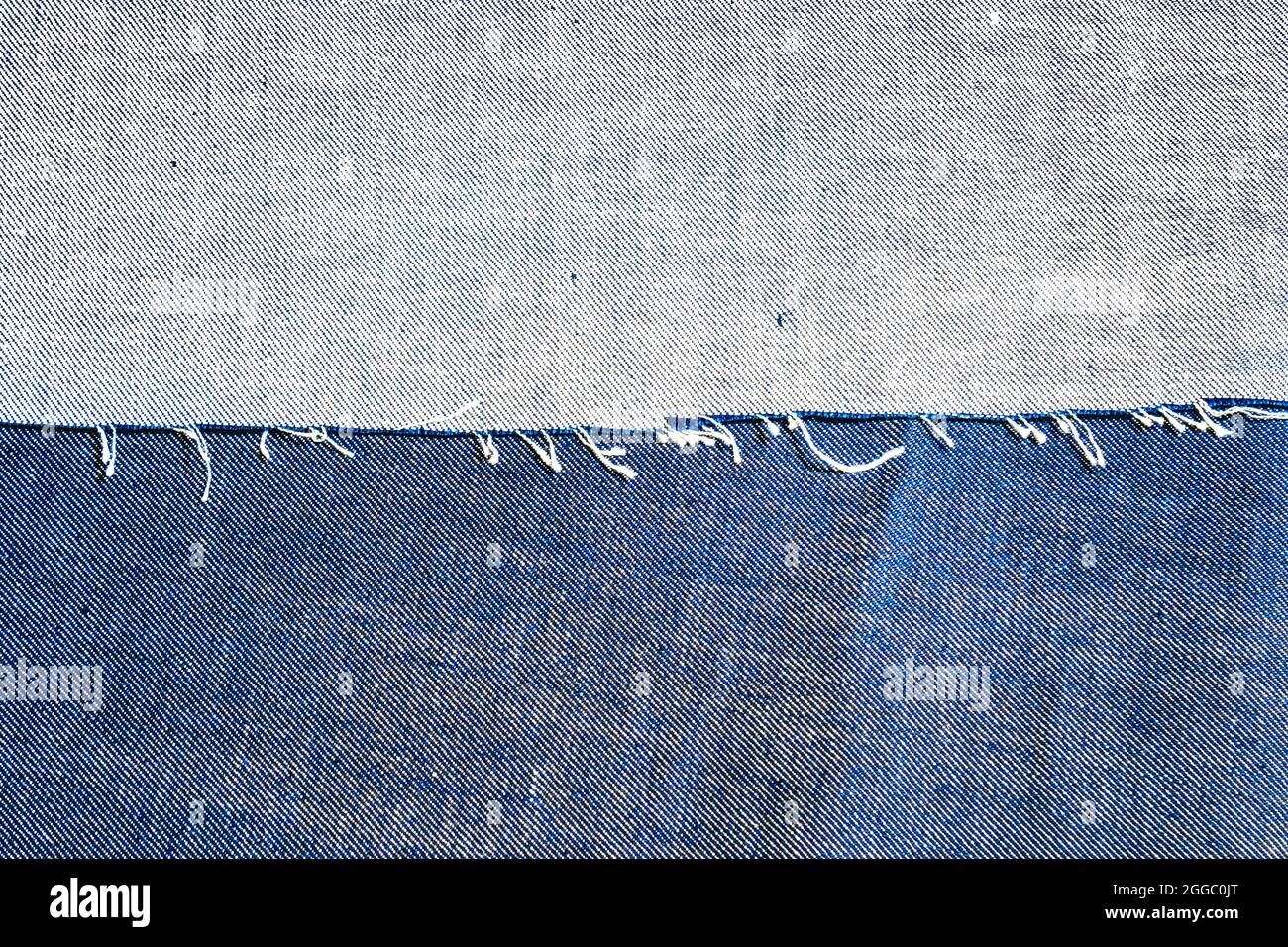 Denim Jeans background. Cut blue denim fabric Stock Photo - Alamy