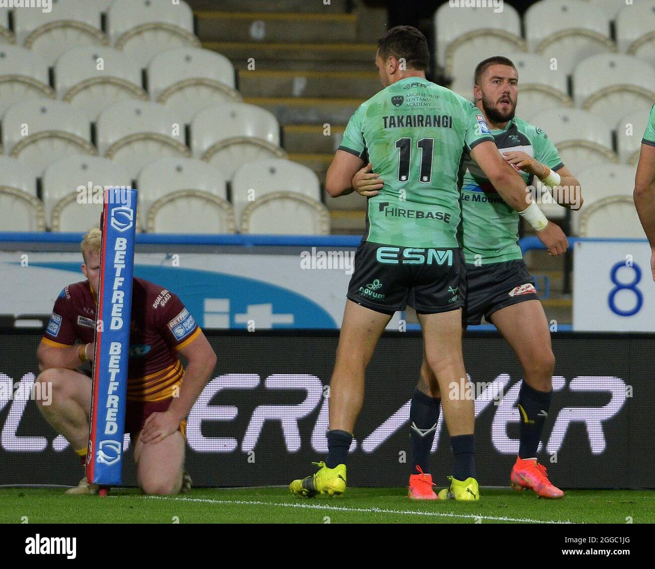 Hull Kingston Rovers' Greg Minikin is congratulated on the 3rd try by ...