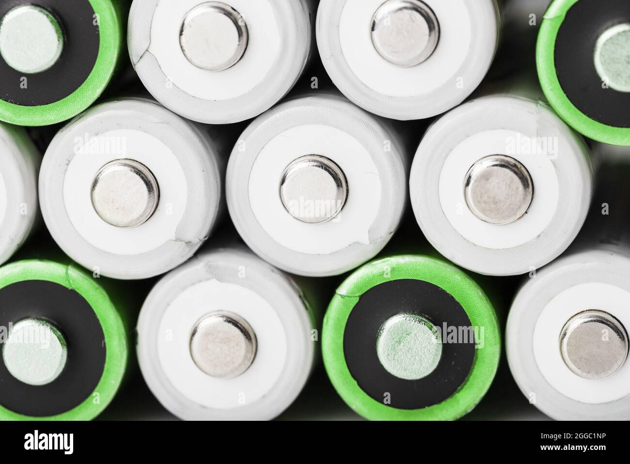 AA batteries as a texture background in full screen. The concept of ...