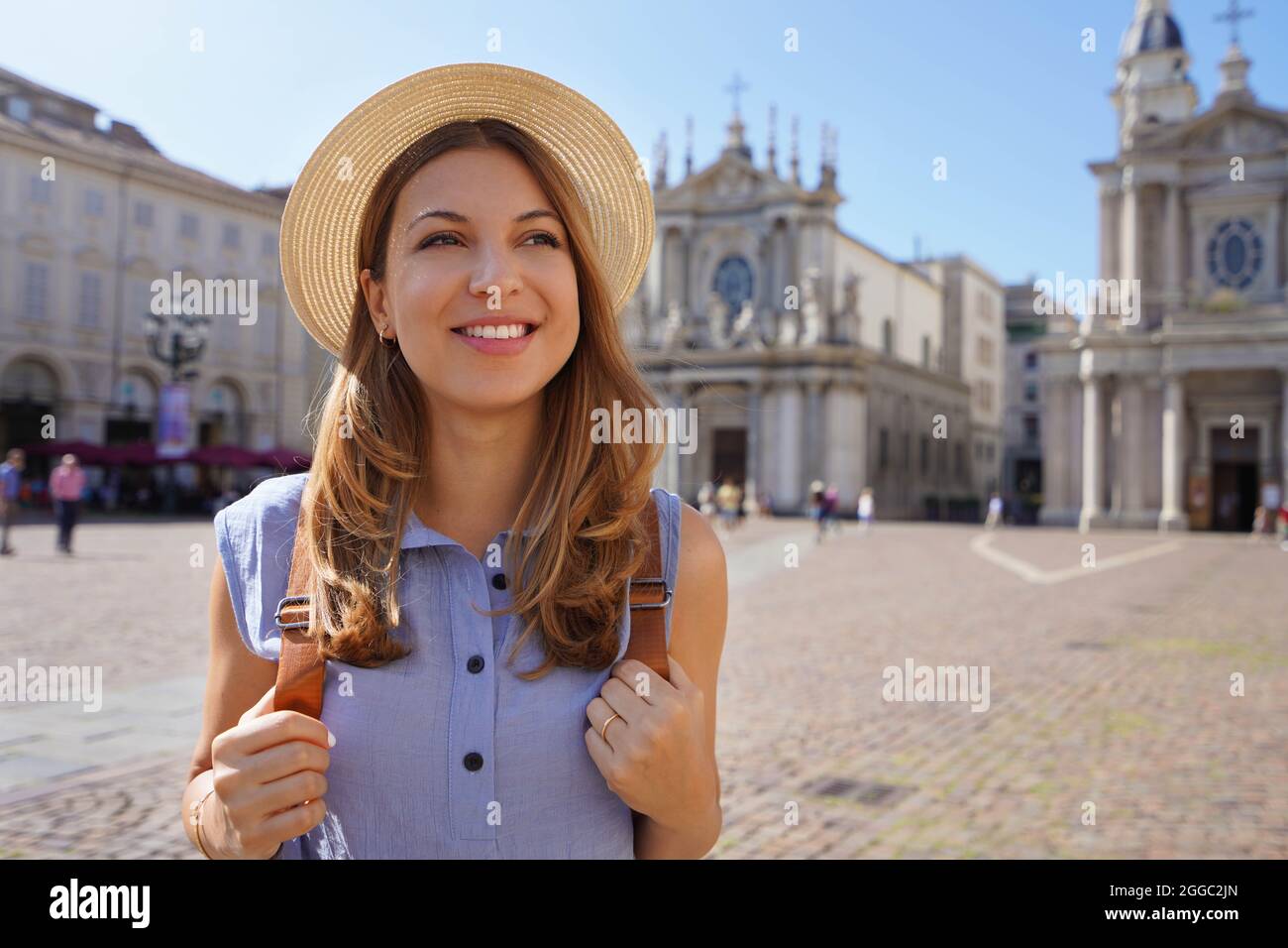 Portrait of beautiful tourist woman in Piazza San Carlo square in Turin ...