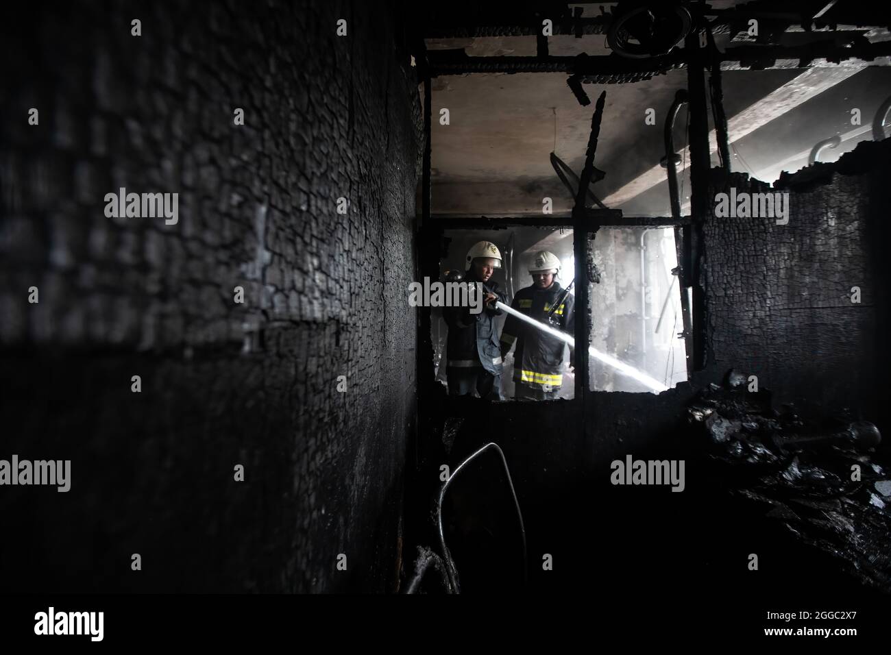 Kathmandu, Nepal. 07th Sep, 2021. Nepalese firefighters try to ...
