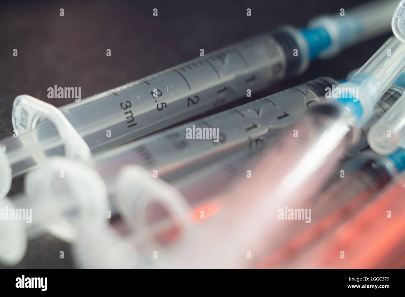 Closeup shot of a bunch of new unused syringes Stock Photo - Alamy