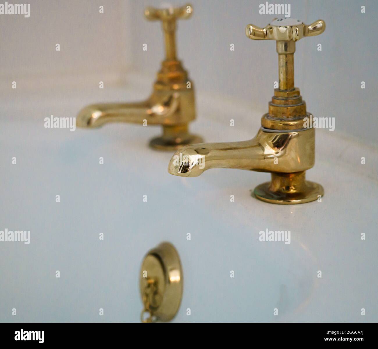 Antique brass taps hi-res stock photography and images - Alamy