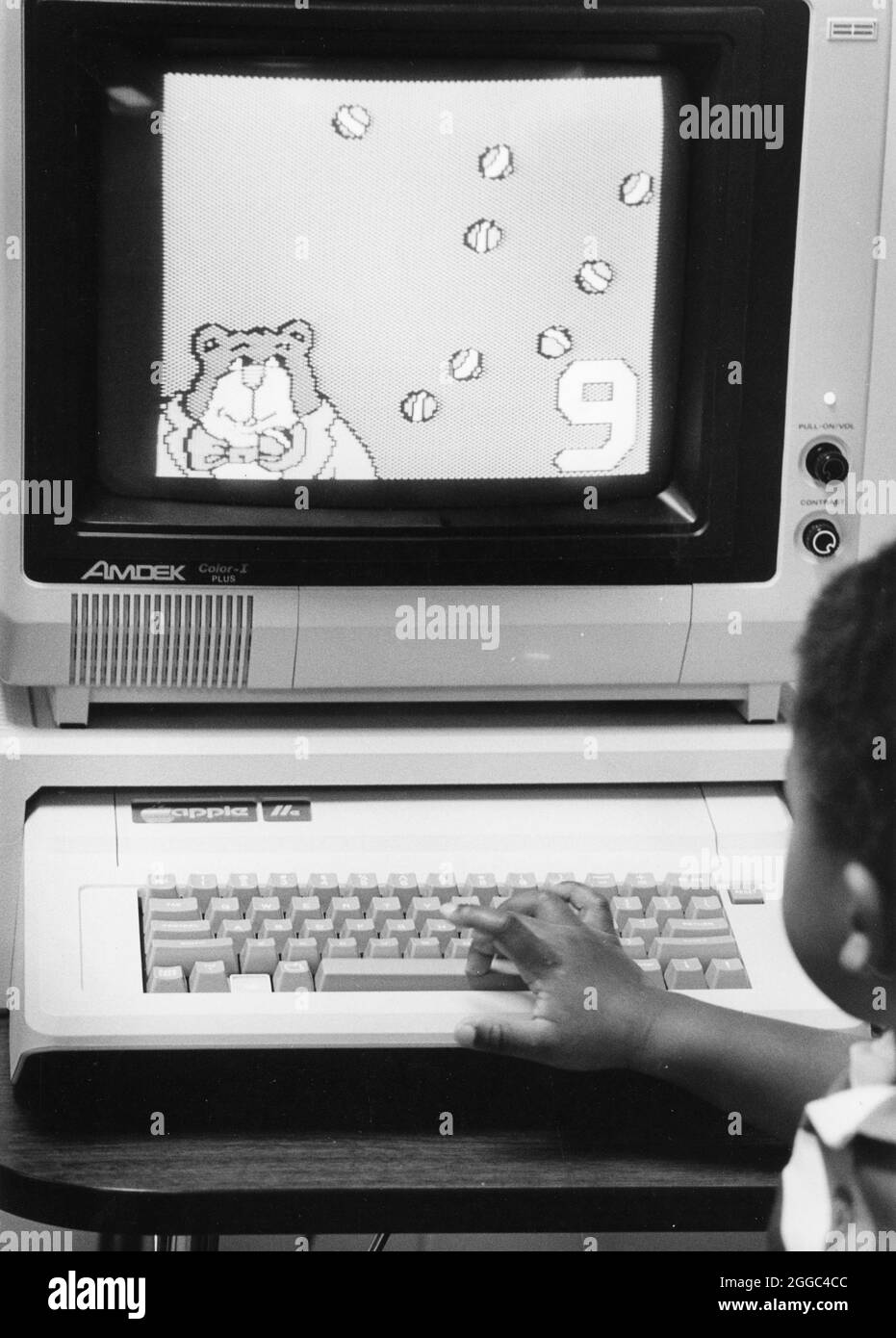 Austin Texas USA, 1989: Black boy day care computer center using Apple ...