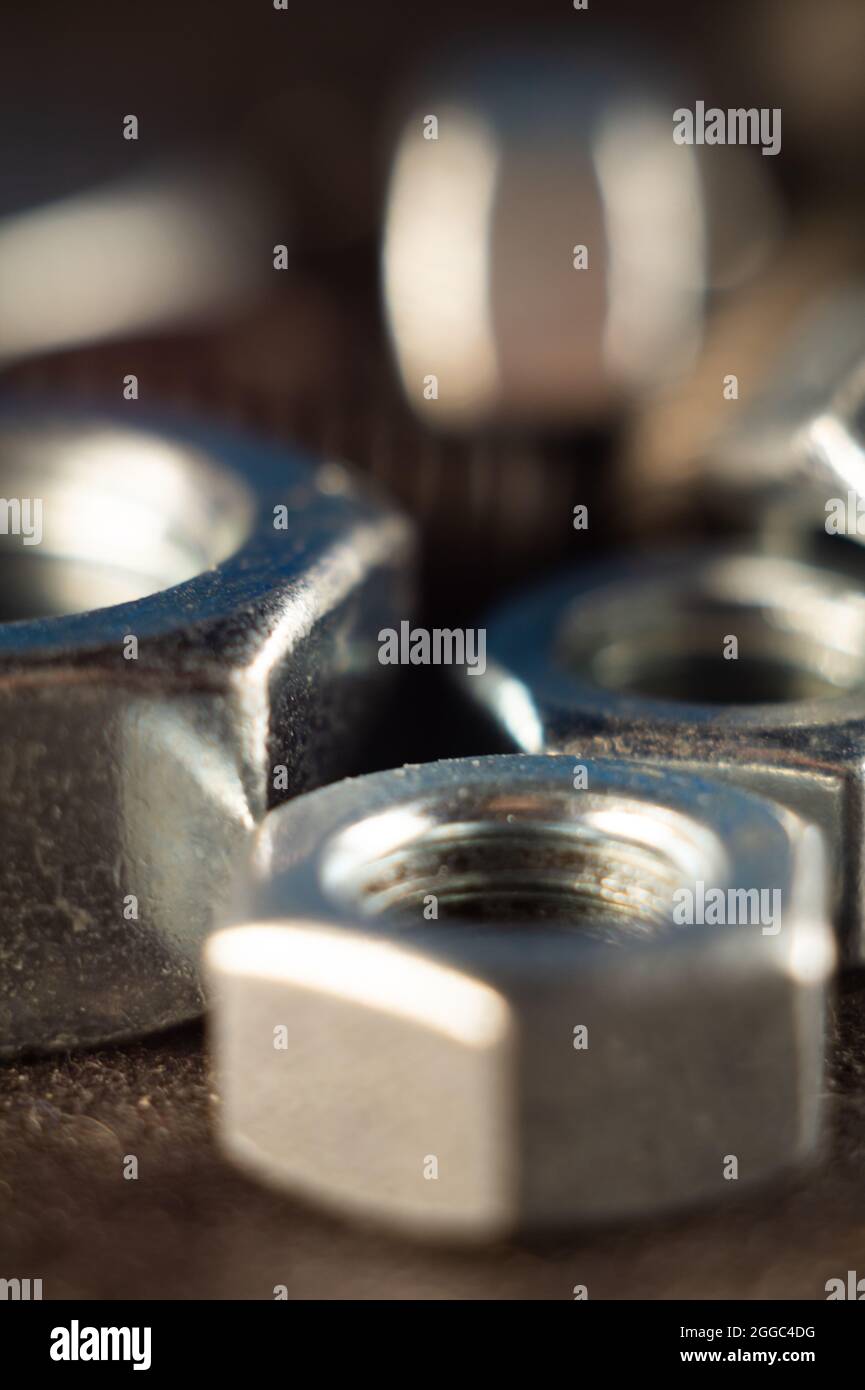 Bolts on dark surface hi-res stock photography and images - Alamy