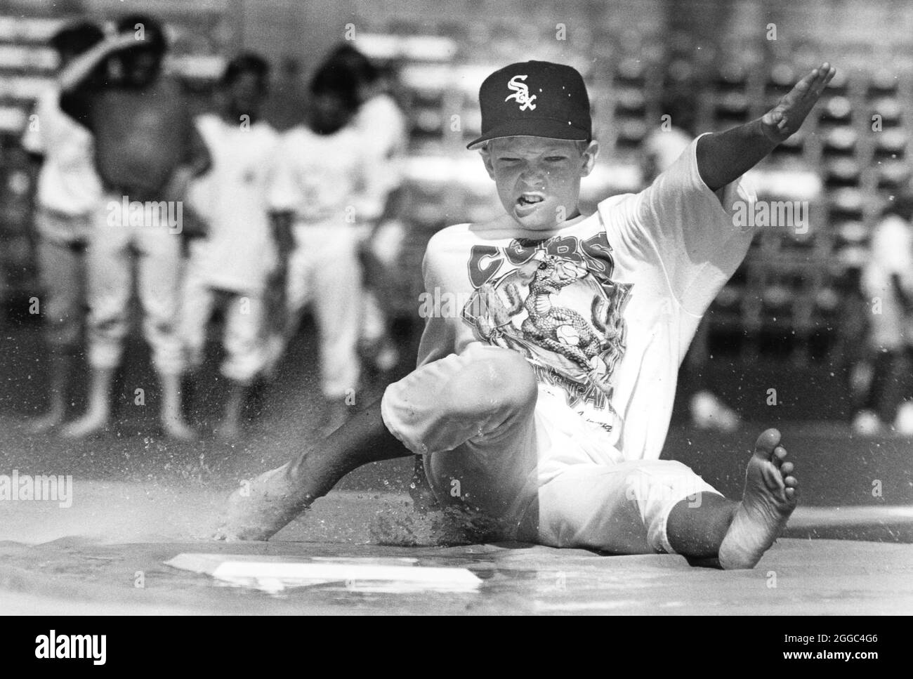 ©1992 Practice Makes Perfect: 6th graders practices sliding into first ...
