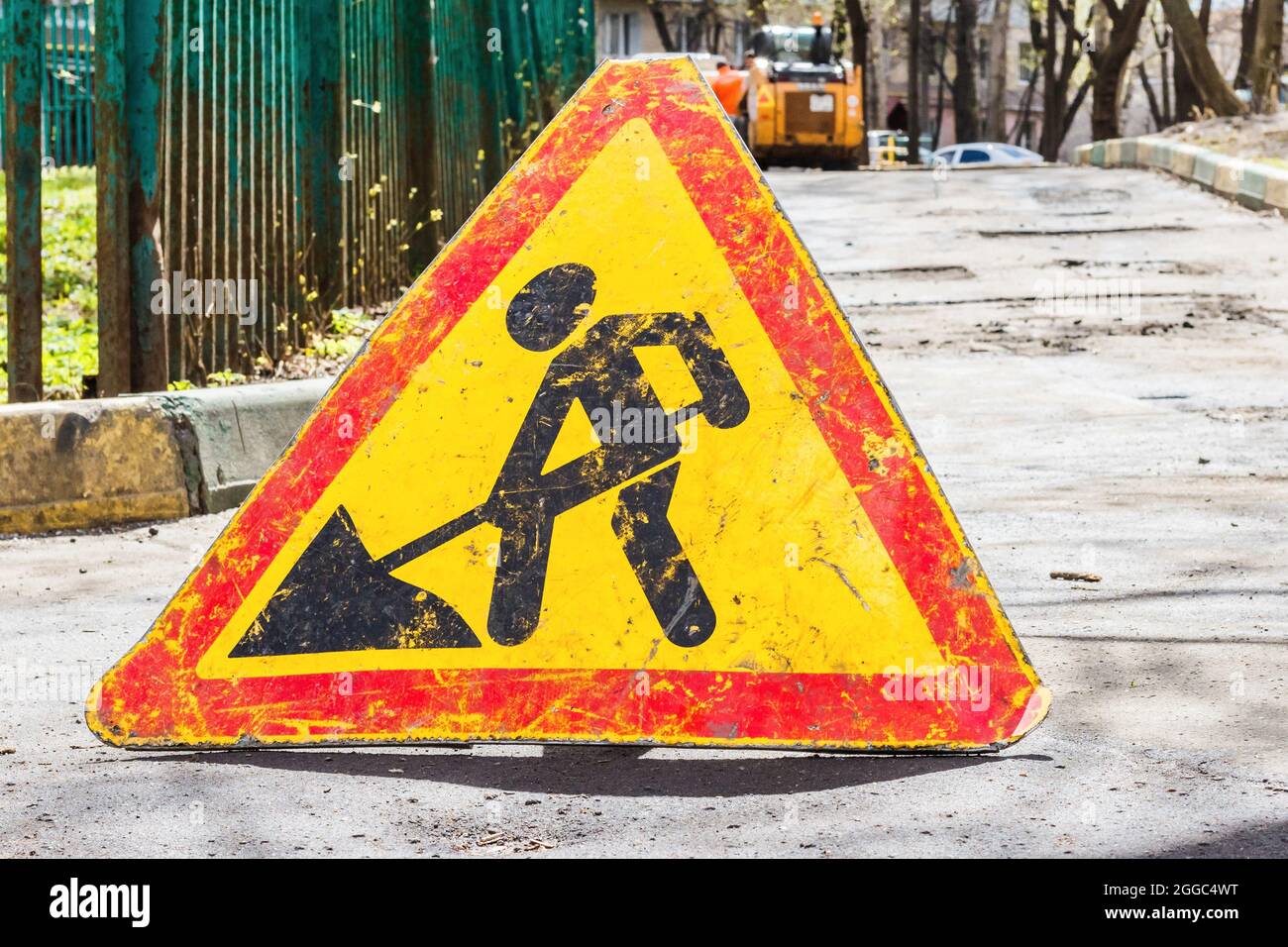 A sign of a man with a shovel. Caution, road works are under way Stock ...