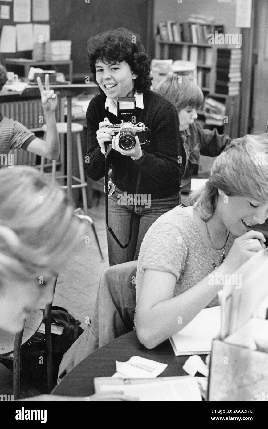 Austin Texas USA, circa 1980s: Female student photographer takes photos ...
