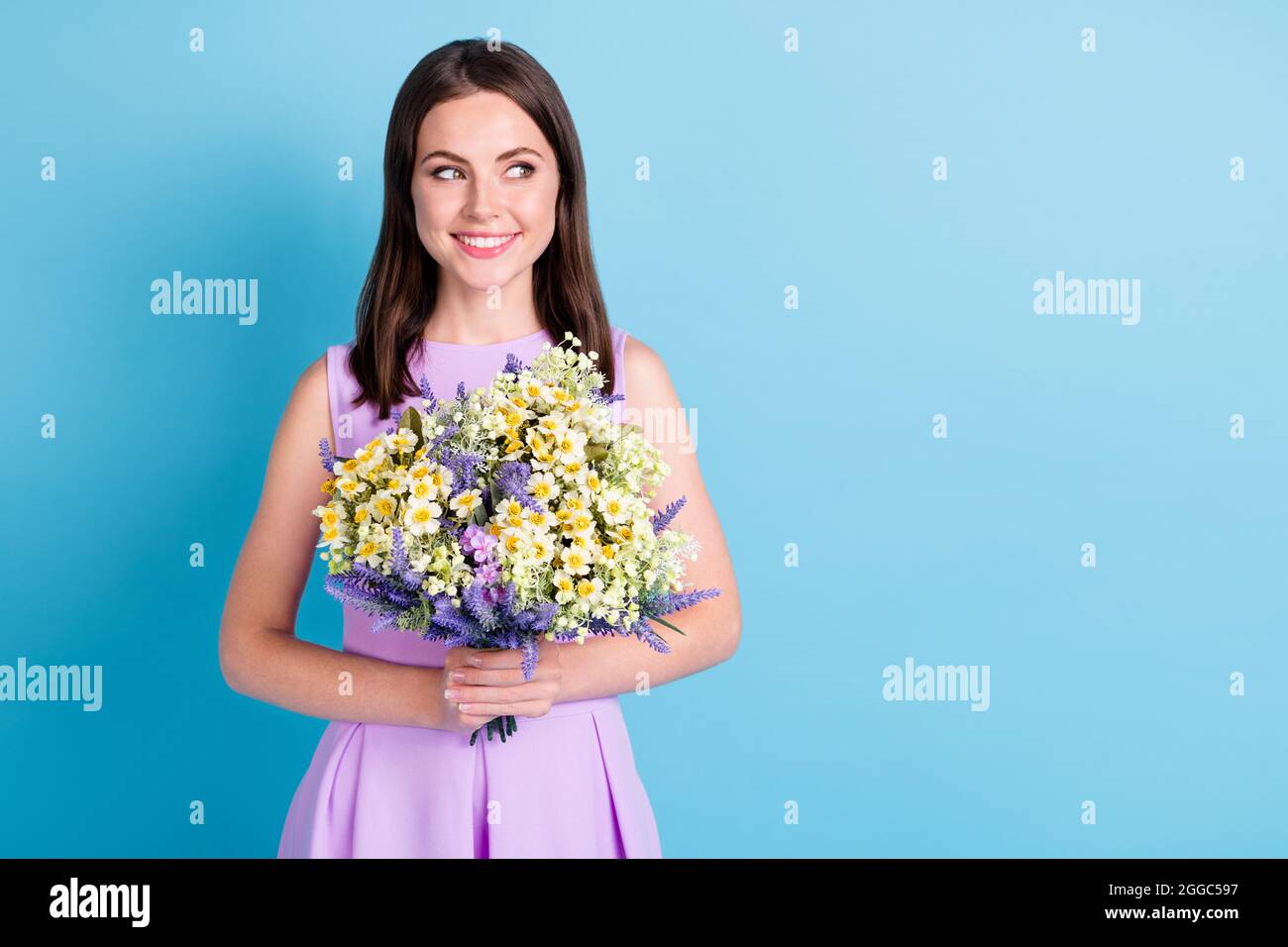 Photo of dreamy gorgeous young woman look imagine empty space hold ...