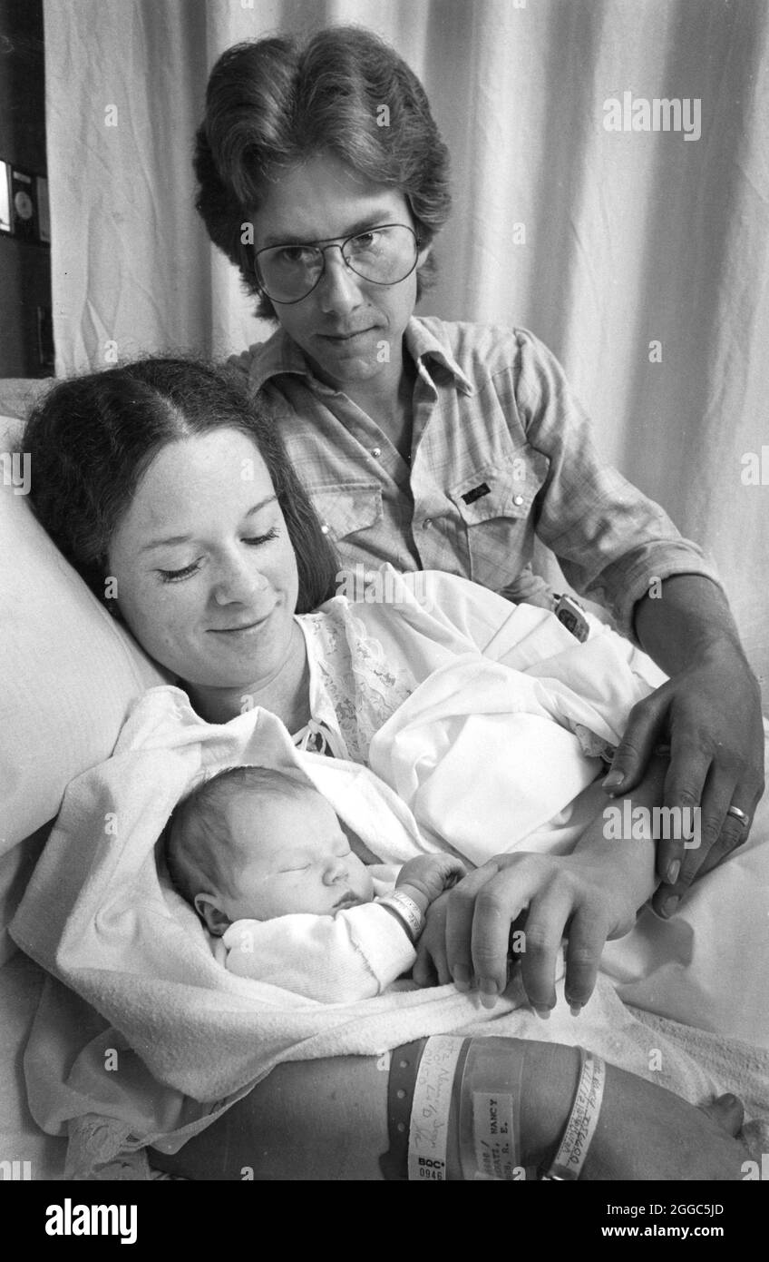 Austin Texas USA, 1982: New father Tim Pankratz looks at his wife ...