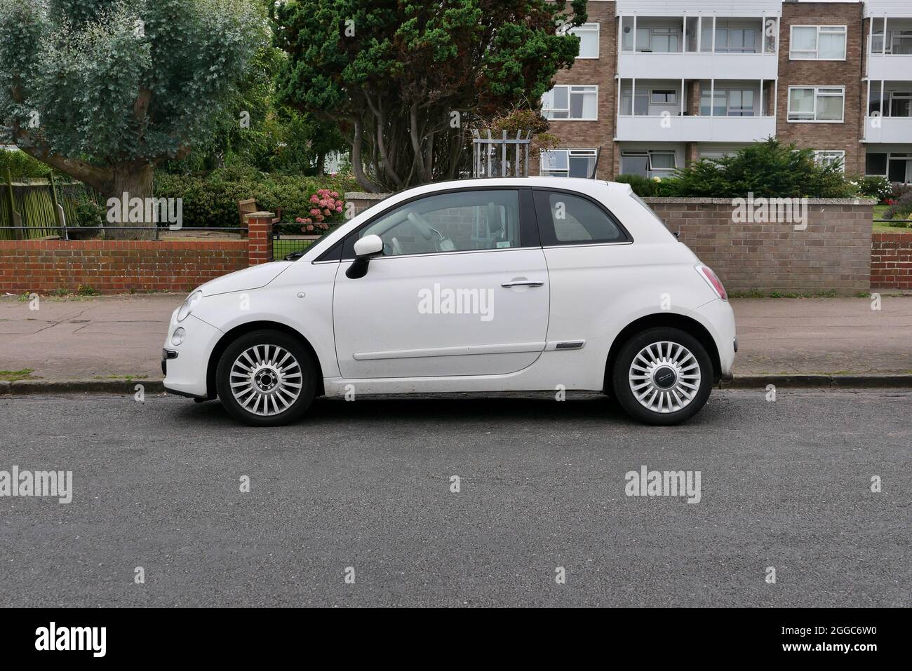 30 August 2021 - Essex, UK: White Fiat 500 parked in road in front of ...