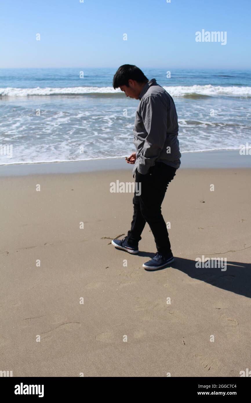 walking on the beach shore Stock Photo - Alamy