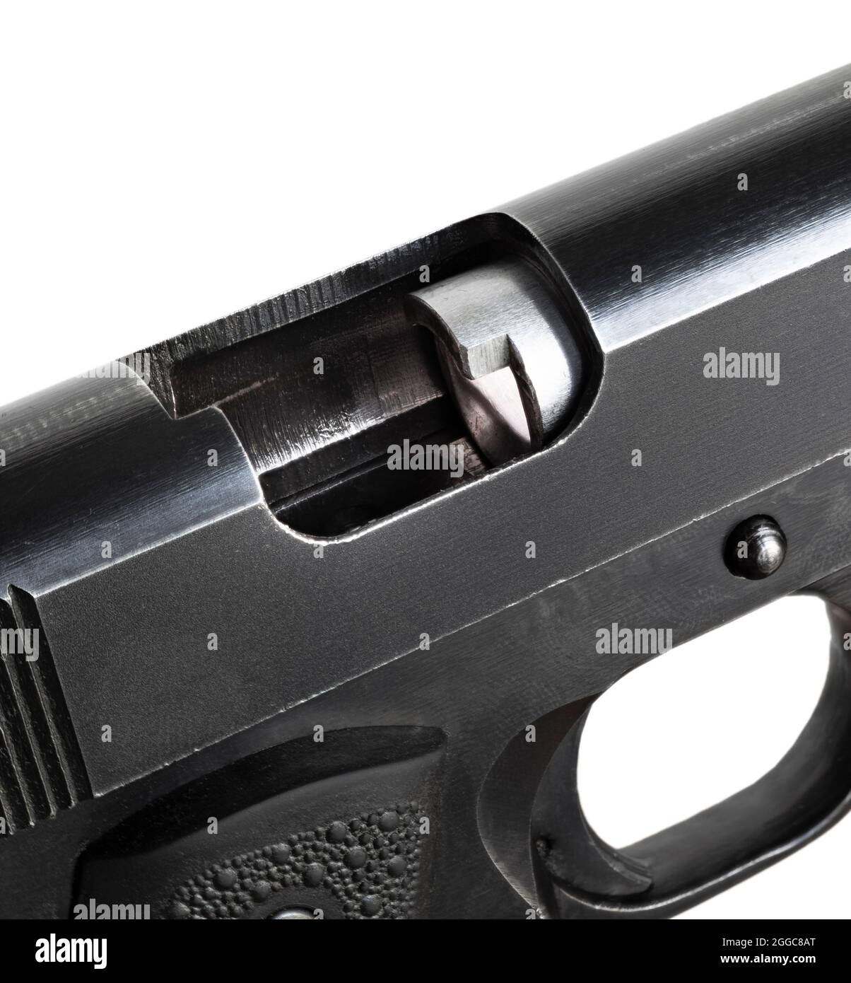 Empty chamber on a semi-automatic pistol isolated on a white background ...