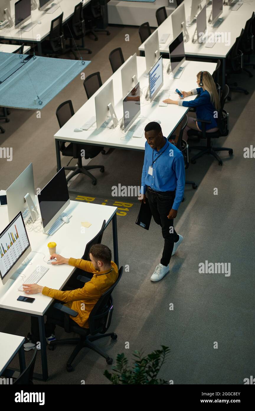 Managers works on computers, workplace in office Stock Photo - Alamy