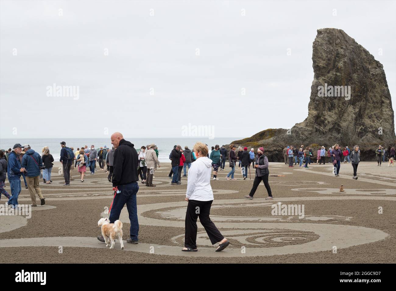 People walking the sand labyrinth in Bandon, Oregon, USA Stock Photo ...