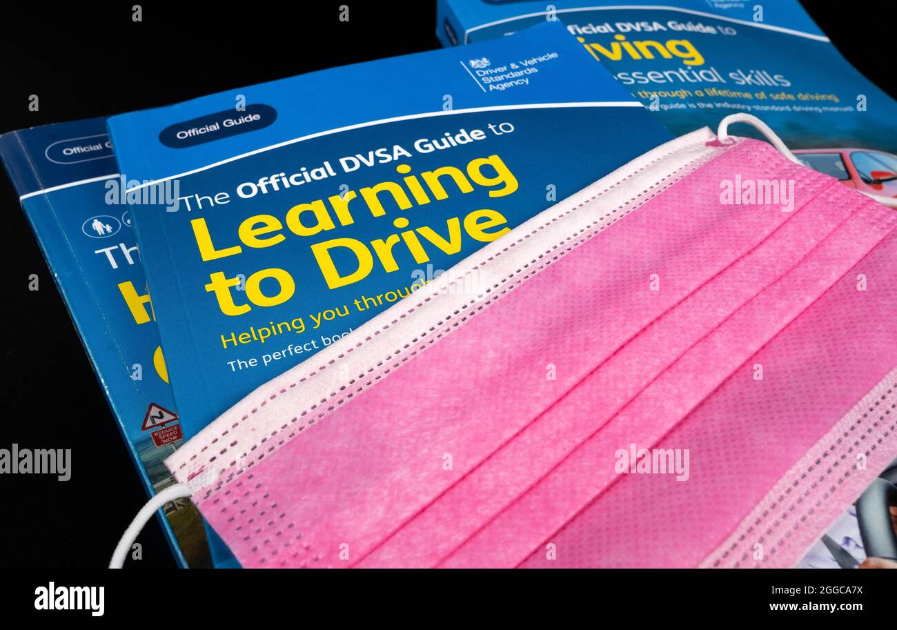 Viral face mask on top of The Official Highway Code, Official DVSA ...