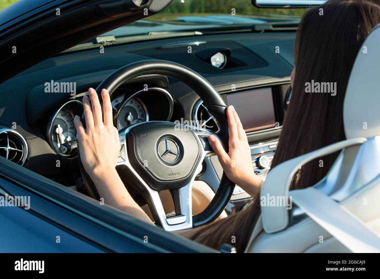 One woman driving luxury car hi-res stock photography and images - Alamy
