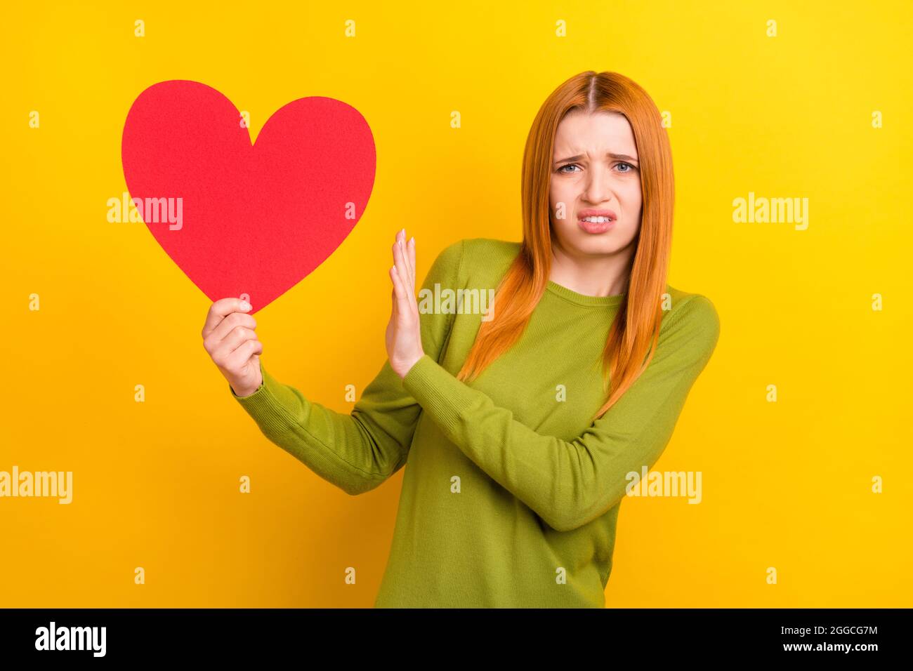 Photo portrait red haired woman keeping heart refusing rejecting ...