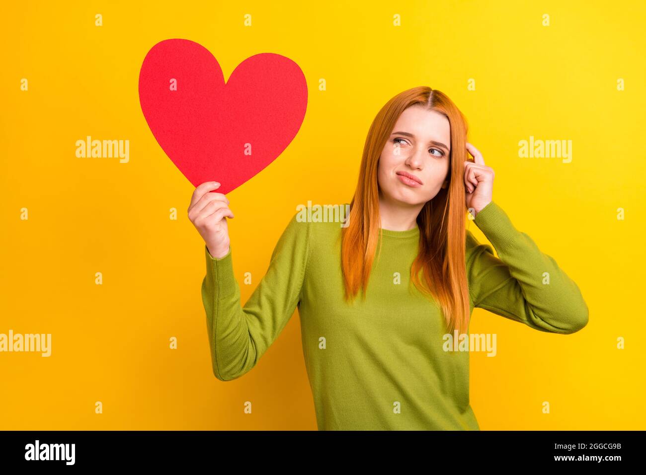 Photo of sad orange hair millennial lady look heart wear green sweater ...