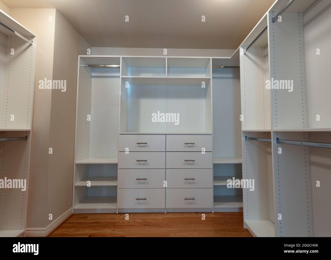 Modern home white interior closet with wood floor Stock Photo - Alamy