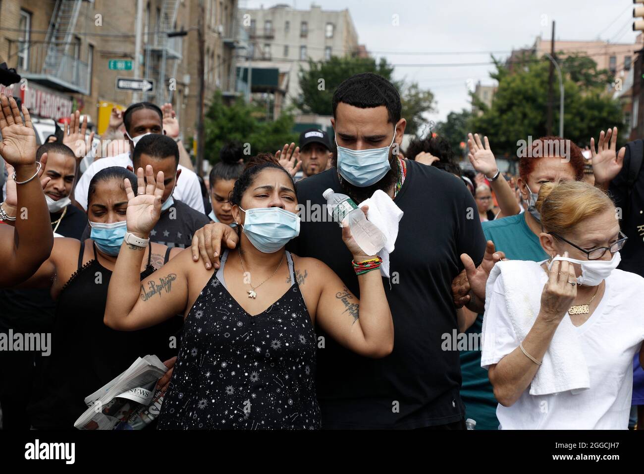 Mother of Mike Rosado, Martha Negron attends a rally dozens march ...