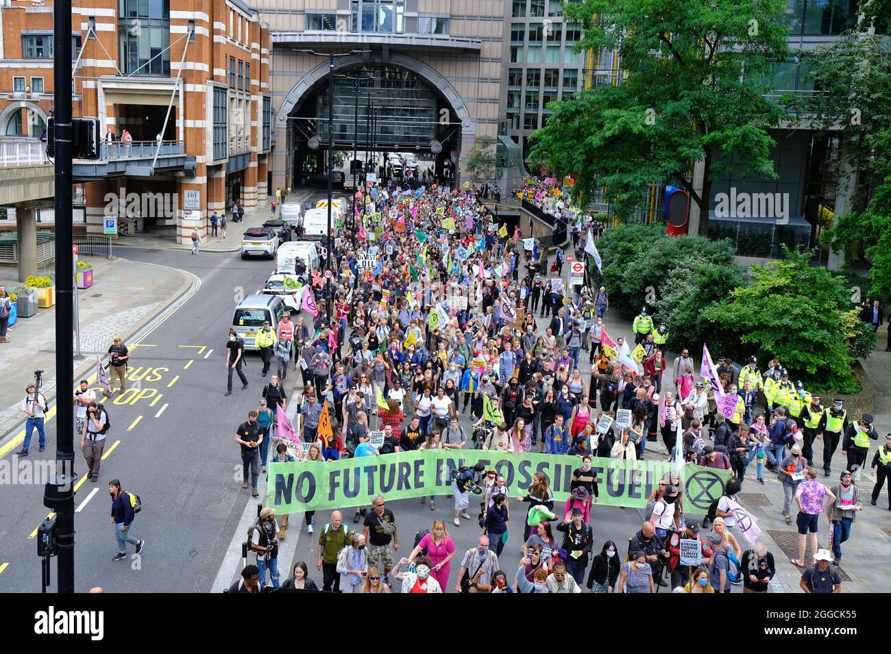 London, UK. Extinction Rebellion march in protest of City institutions ...