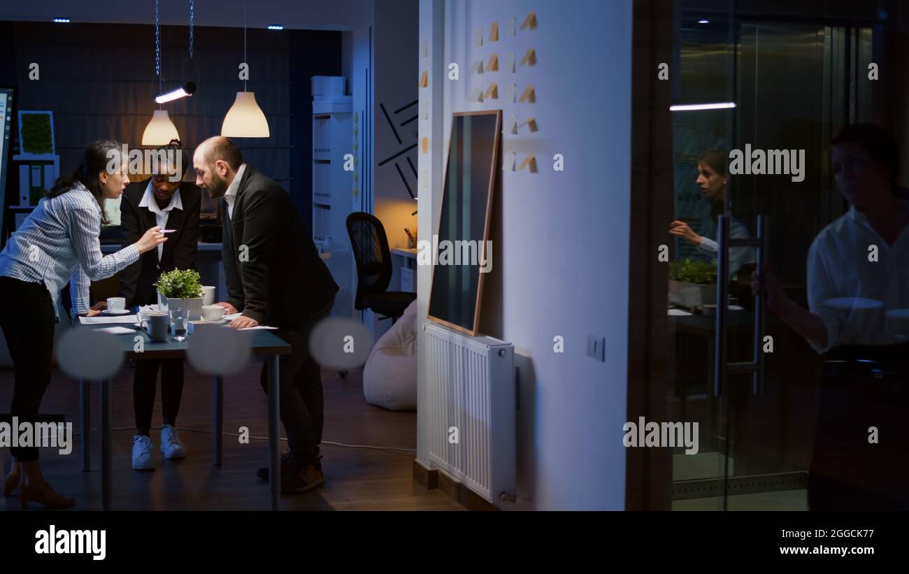 Entrepreneur business woman enter in office meeting room late at night ...