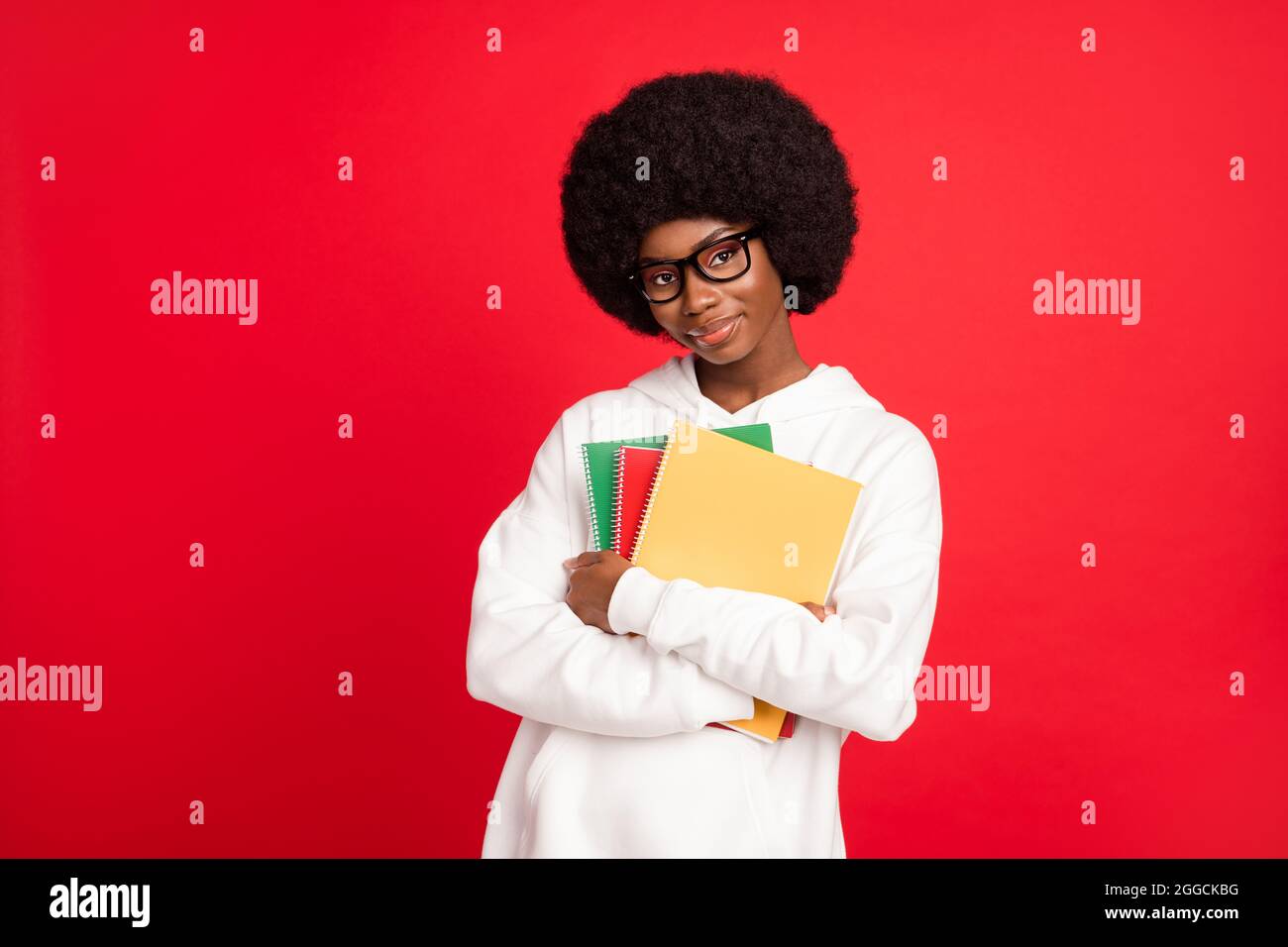 Photo of clever curly hairdo young lady hold books wear eyewear white ...