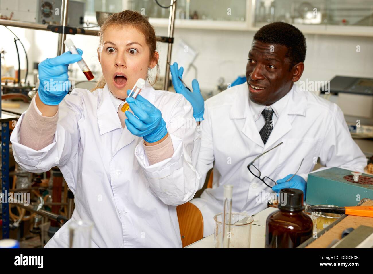Worriend and scared male and female scientists after experiment Stock ...