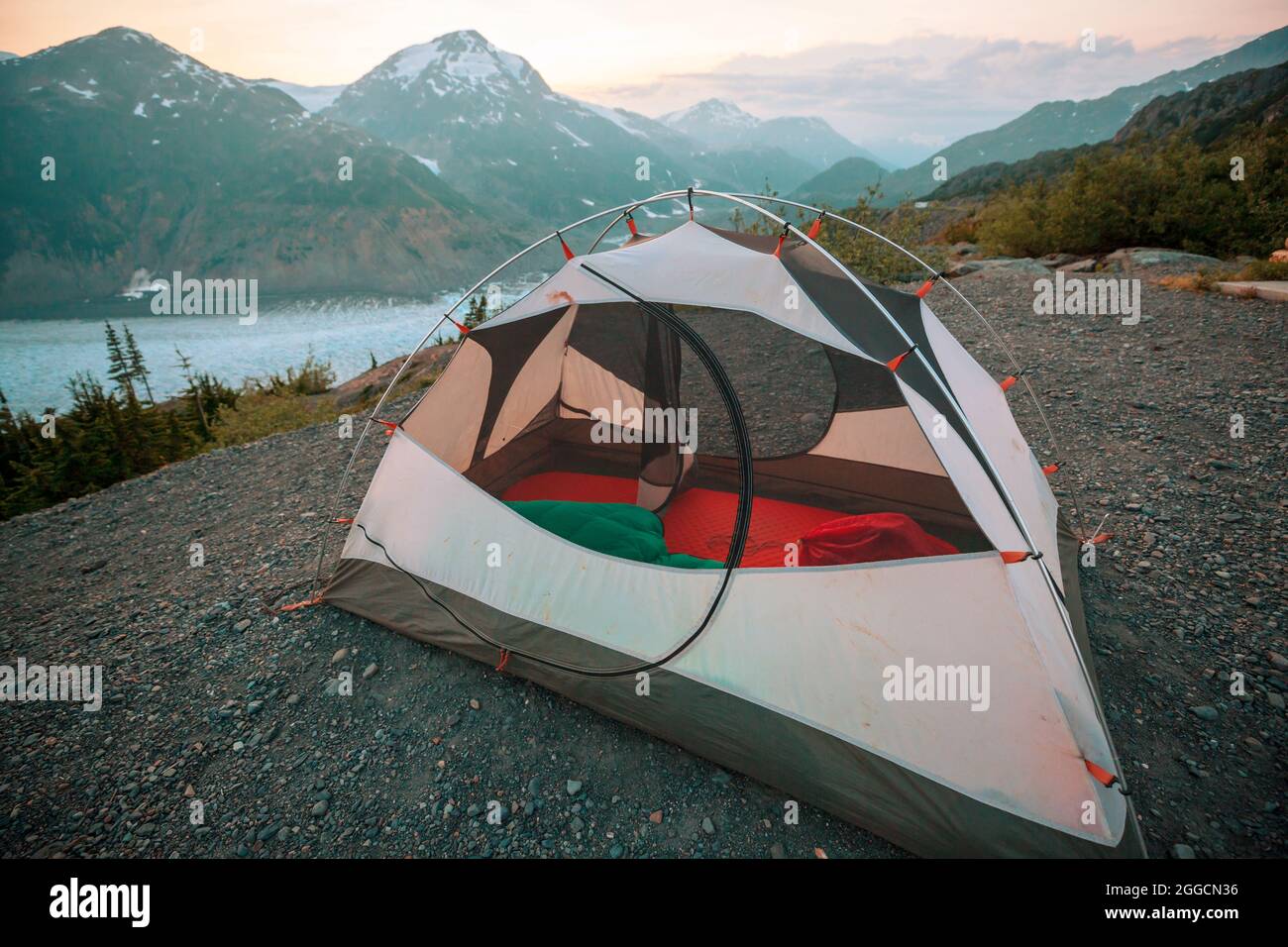 Hiking tent in the mountains in summer season Stock Photo - Alamy