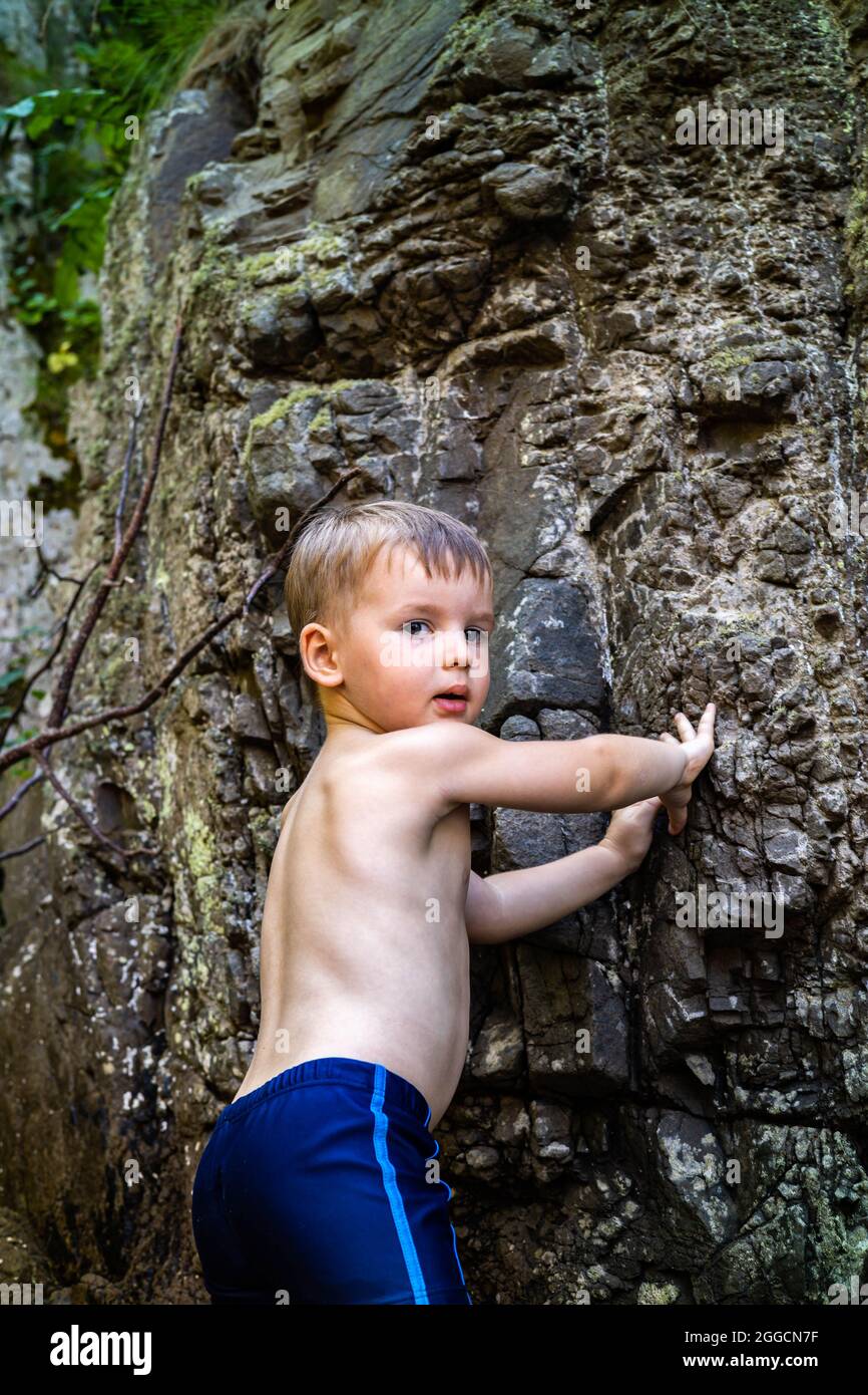 Kid climbing mountain hi-res stock photography and images - Alamy