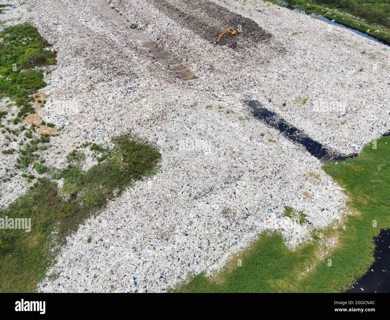 Aerial view landfill garbage waste huge dump environmental pollution ...