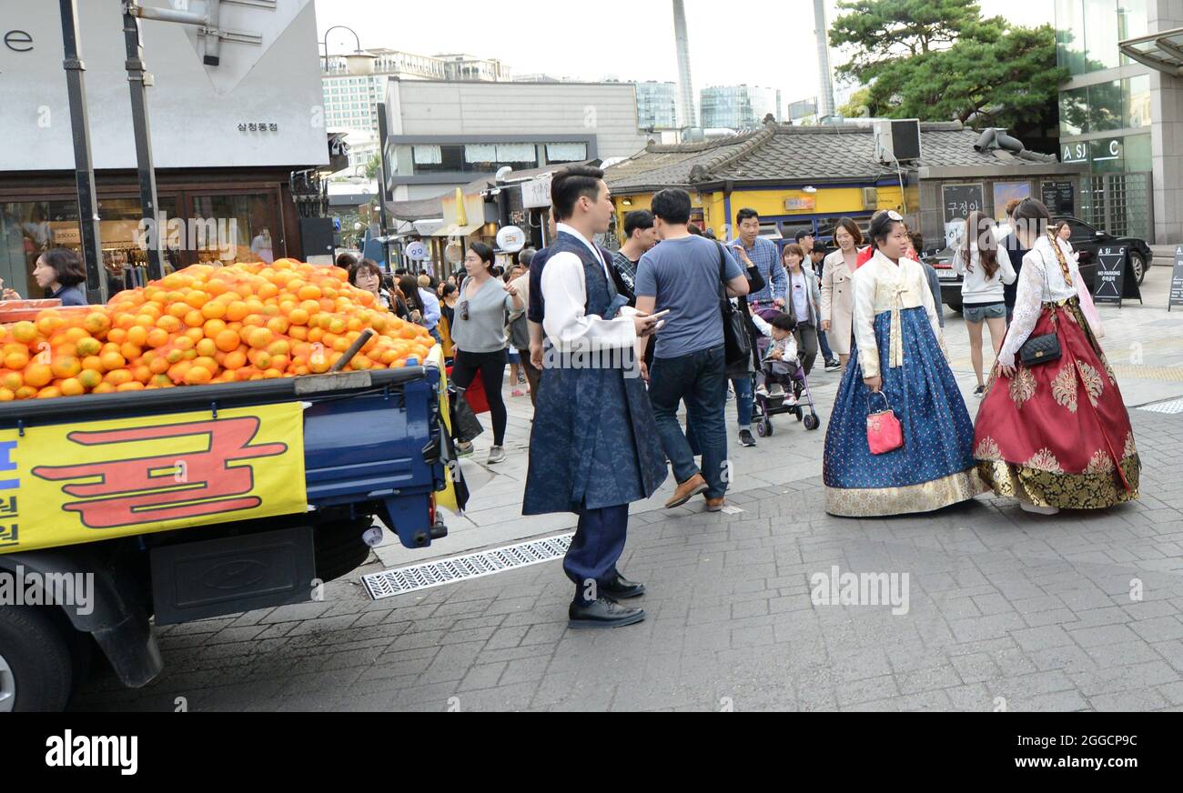 Tourist dressed up in traditional Korean outfit at the Bukchon Hanok ...
