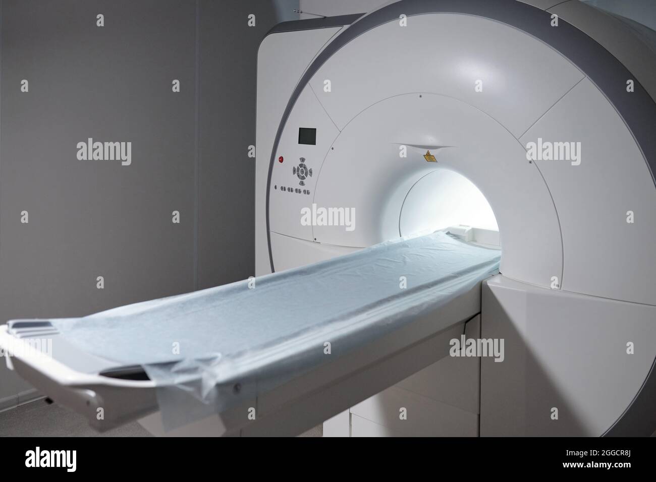 MRI scan with long table for patient standing in medical research ...