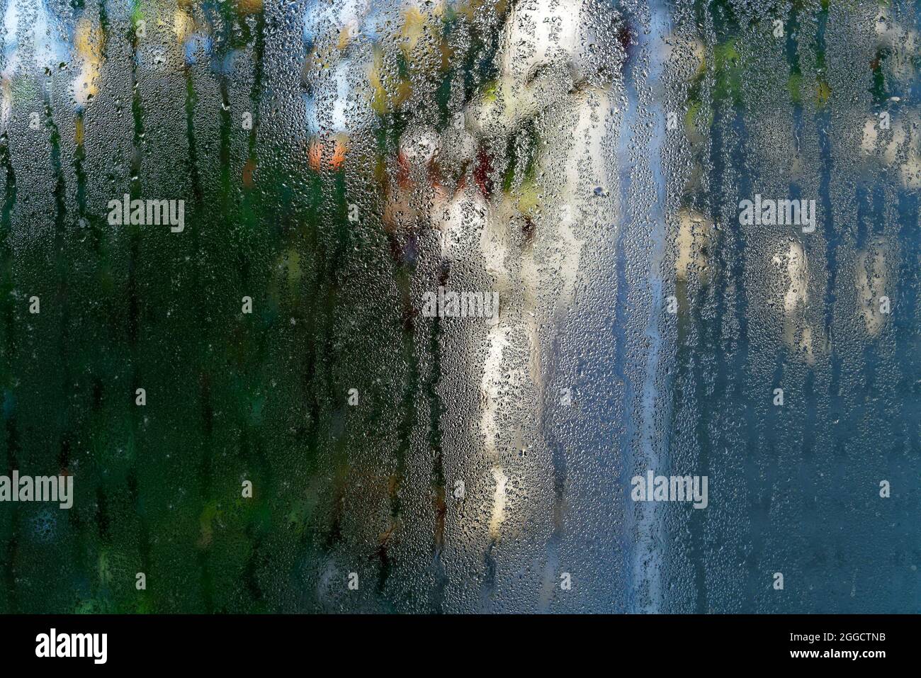 Condensation on the inside of a window in a cold damp house Stock Photo ...