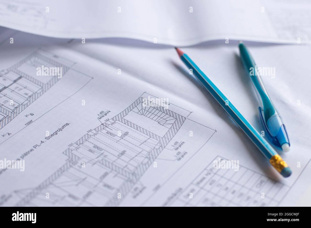 drawings of a construction engineer on a sheet of paper Stock Photo - Alamy
