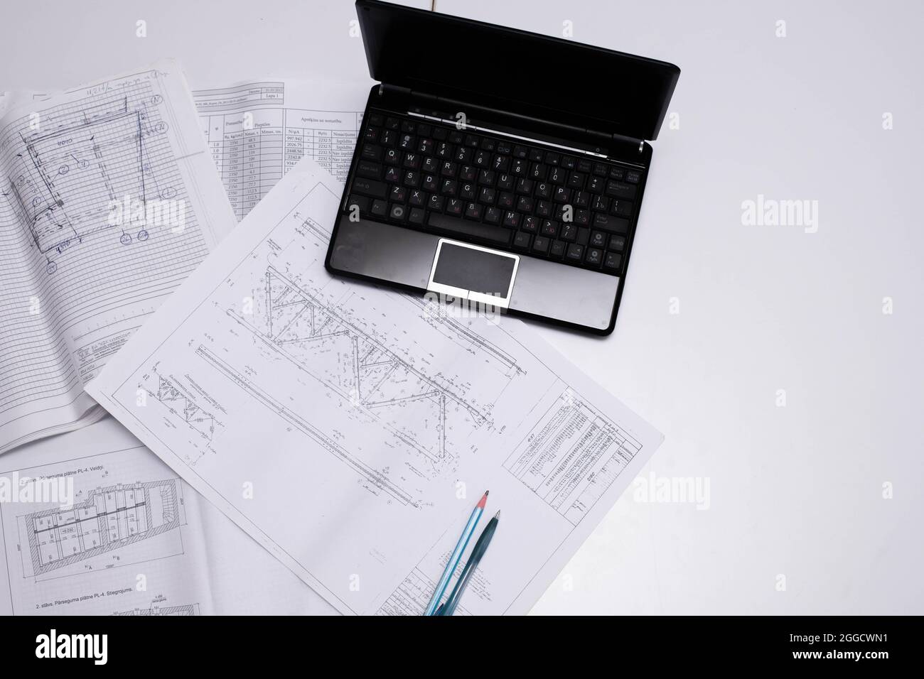 drawings of a construction engineer on a sheet of paper Stock Photo - Alamy