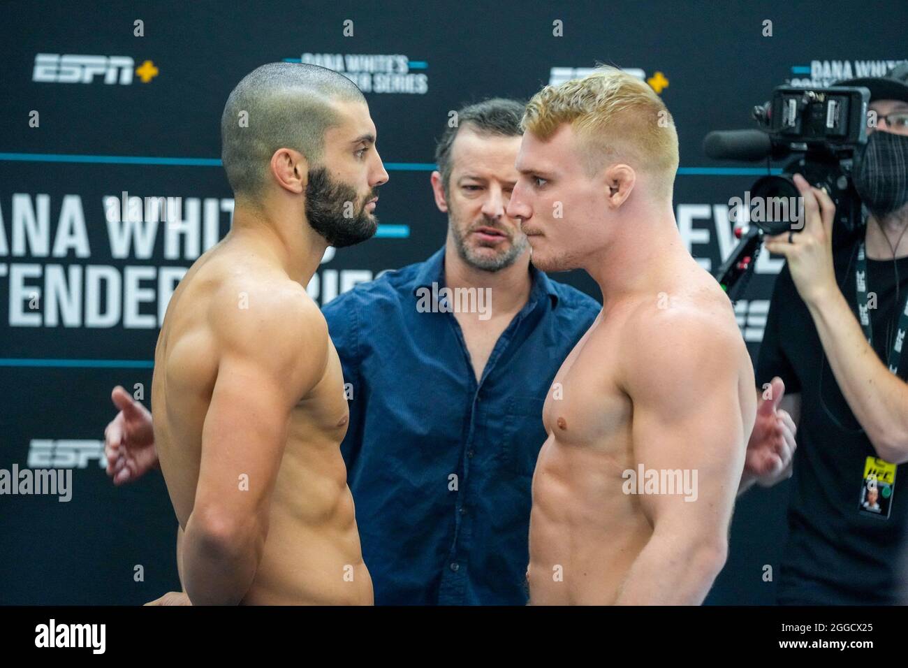 Leanardo Damiani (left) and AJ Fletcher (right) face-off with Sean ...