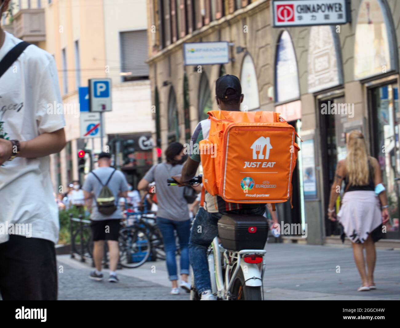 MILAN, ITALY - Aug 08, 2021: A "Just eat" food delivery rider on a ...