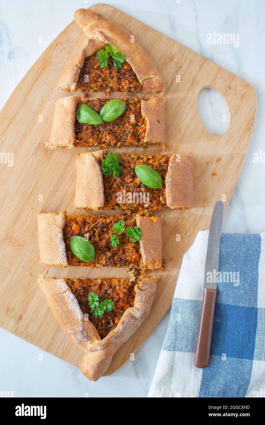 Traditional Turkish flatbreads known as kasarli sucuklu pide Stock ...